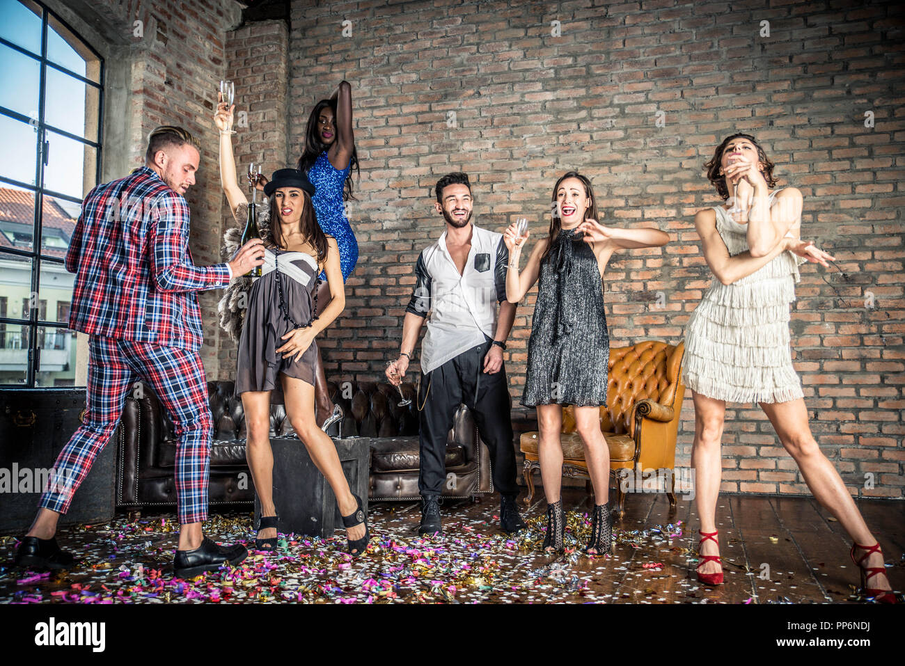 Multicultural group of friends having party - Happy people having fun ...