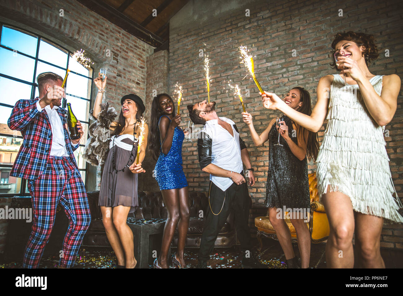 Multicultural group of friends having party - Happy people having fun ...