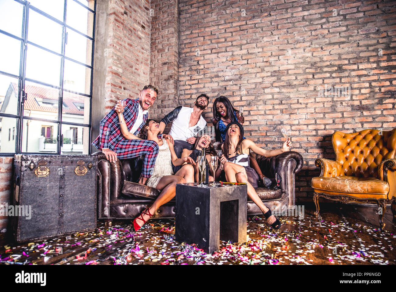 Multicultural group of friends having party - Happy people having fun ...