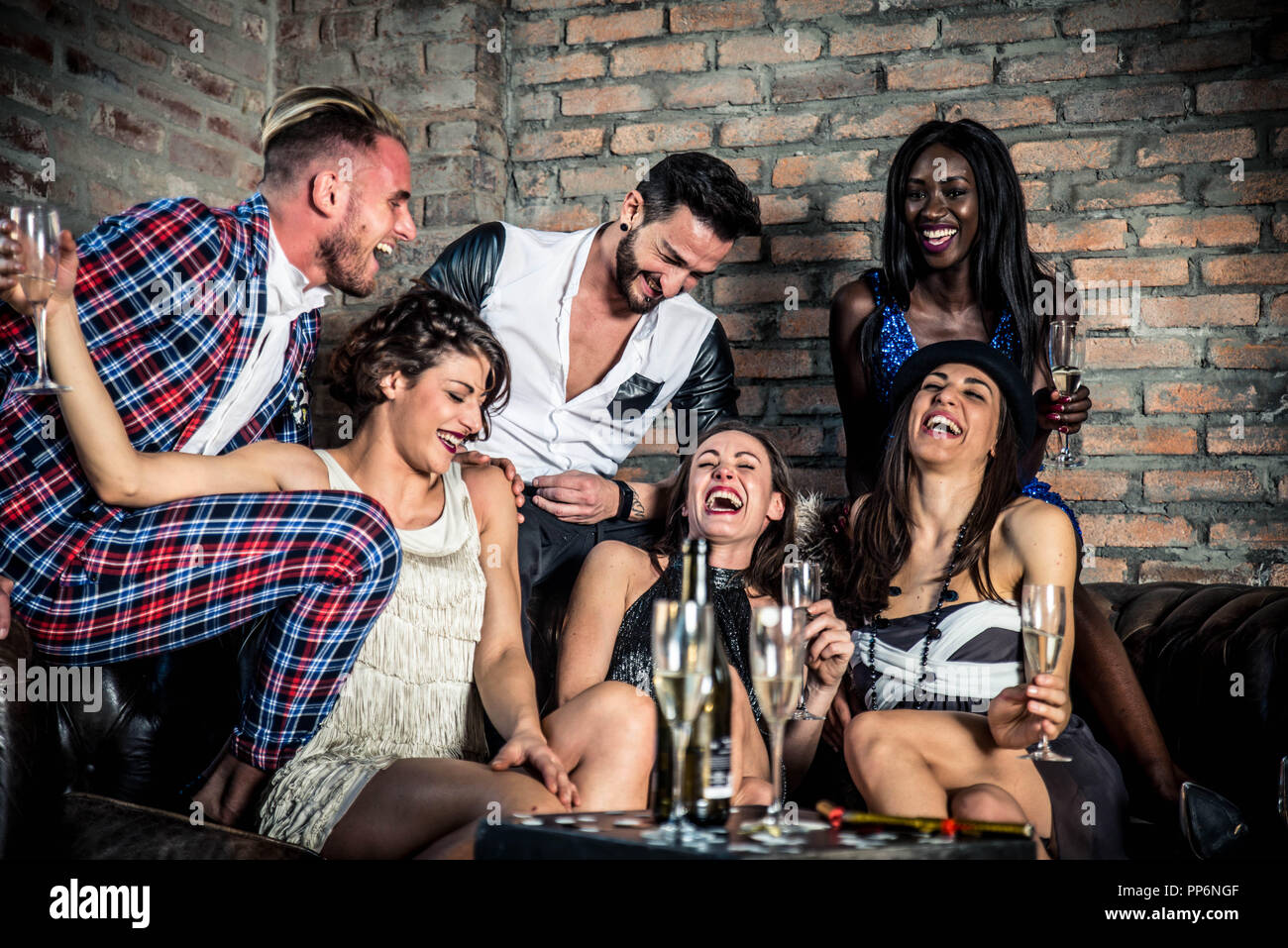 Multicultural group of friends having party - Happy people having fun ... Multicultural group of friends having party - Happy people having fun ...