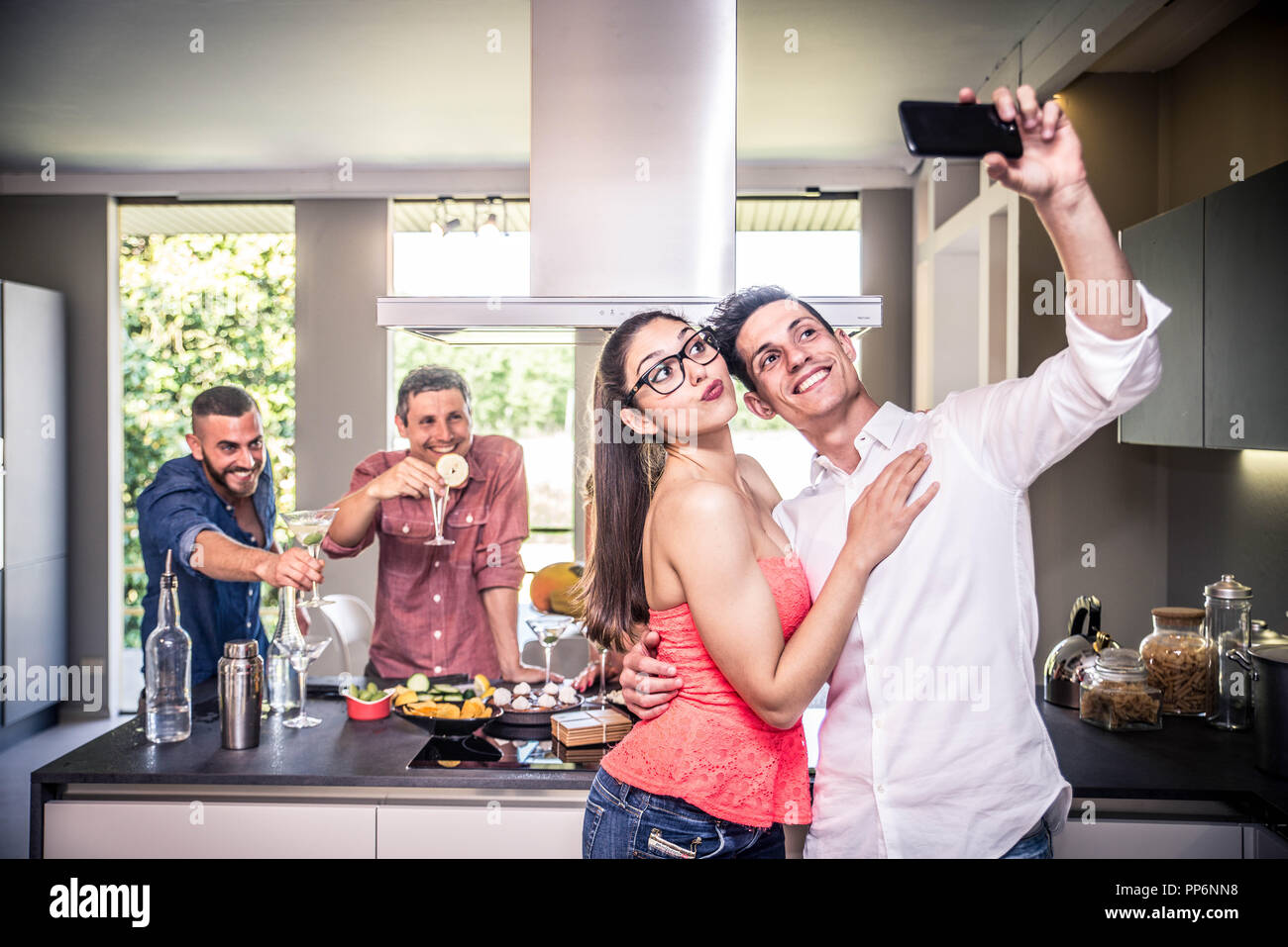 Cheerful friends having snack hi-res stock photography and images - Alamy