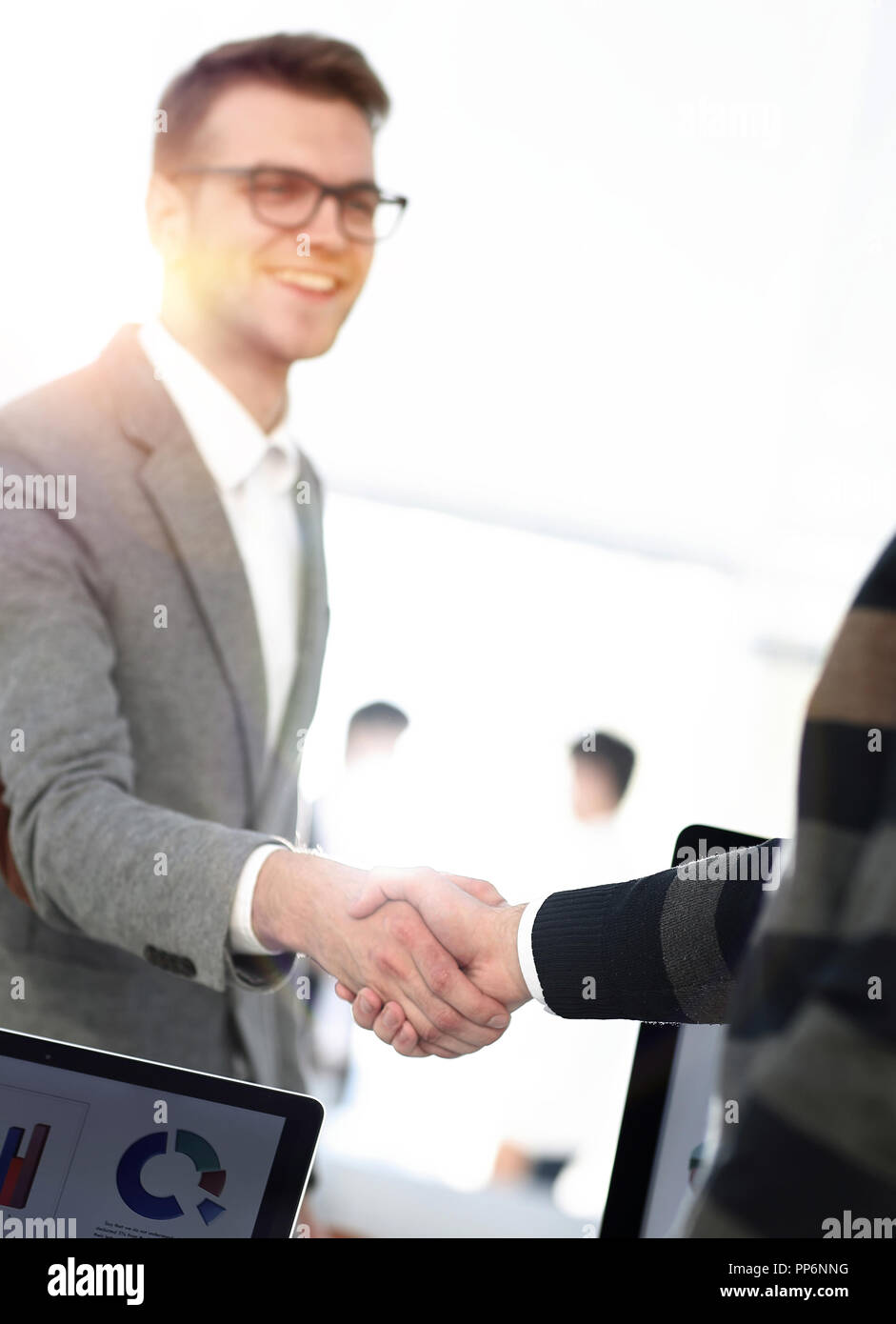 welcome handshake financial partners Stock Photo - Alamy