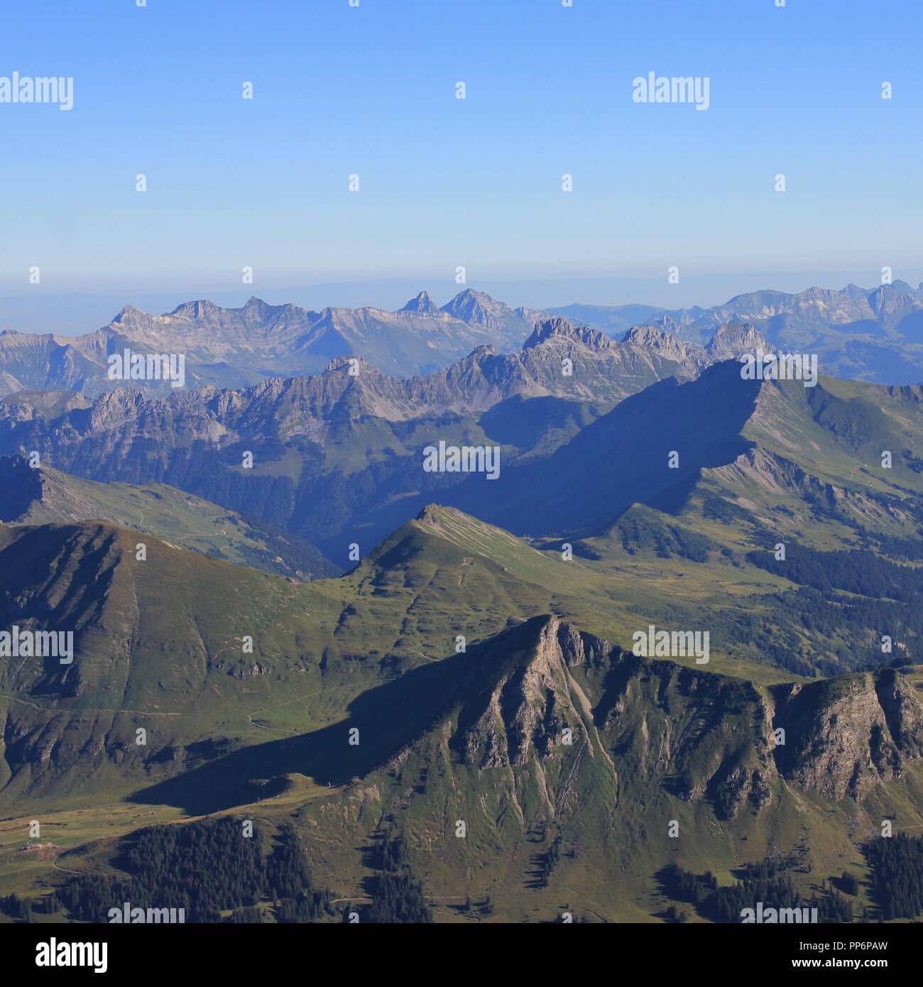 Mountain ranges in the Swiss Alps seen from Glacier 3000, Switzerland ...