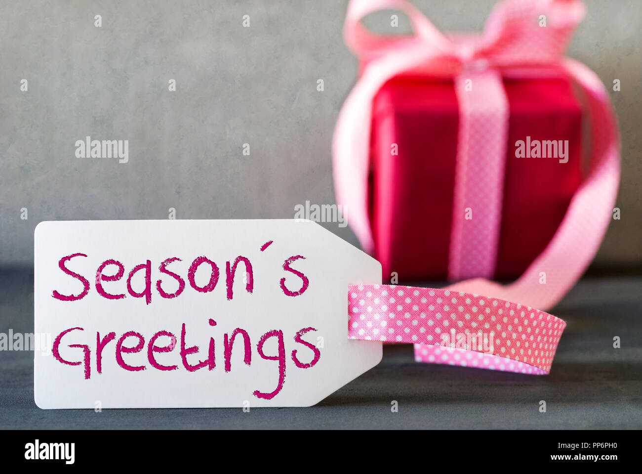 Pink Gift, Label, English Text Seasons Greetings Stock Photo - Alamy