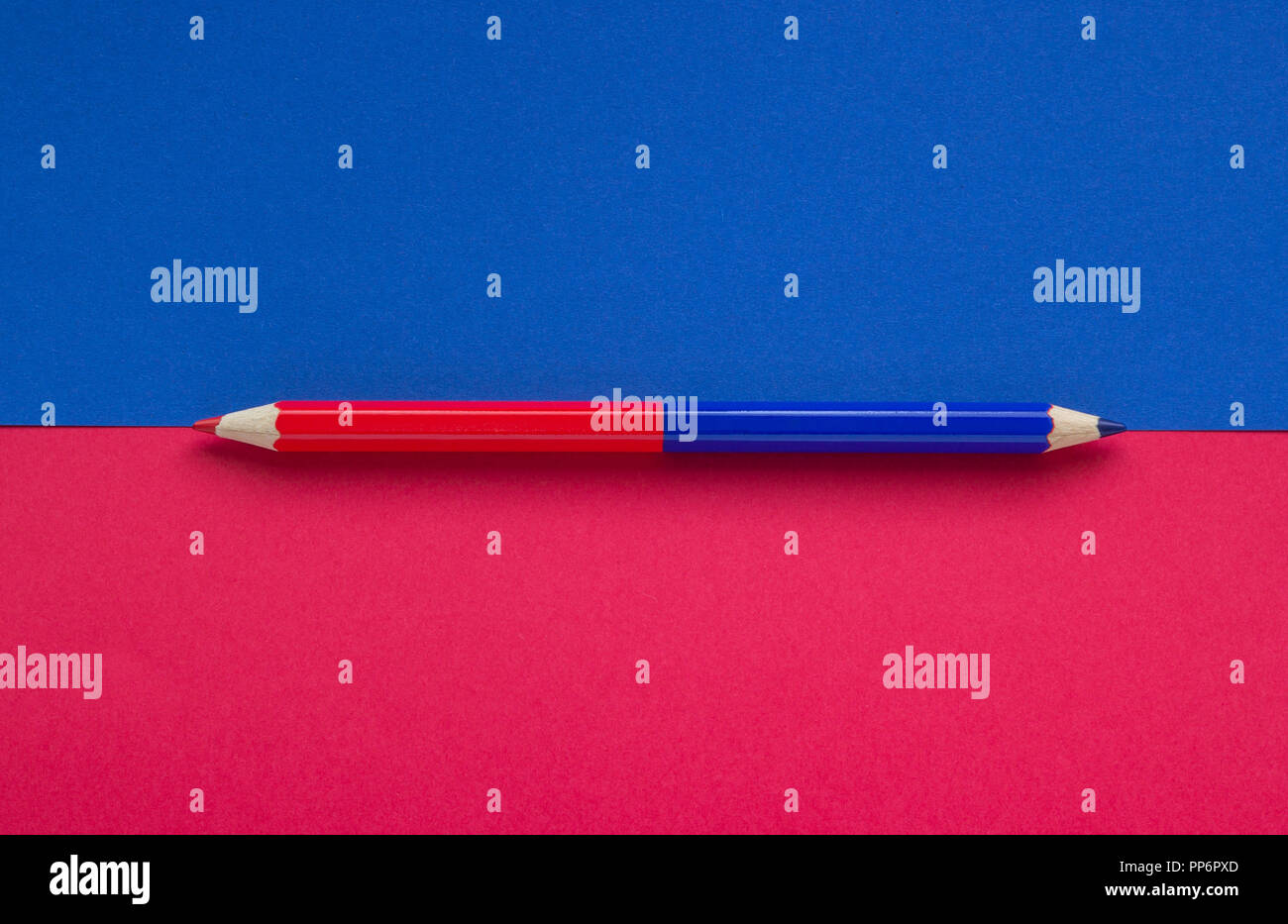 Close-up of a red blue pencil on a background, concept of education ...