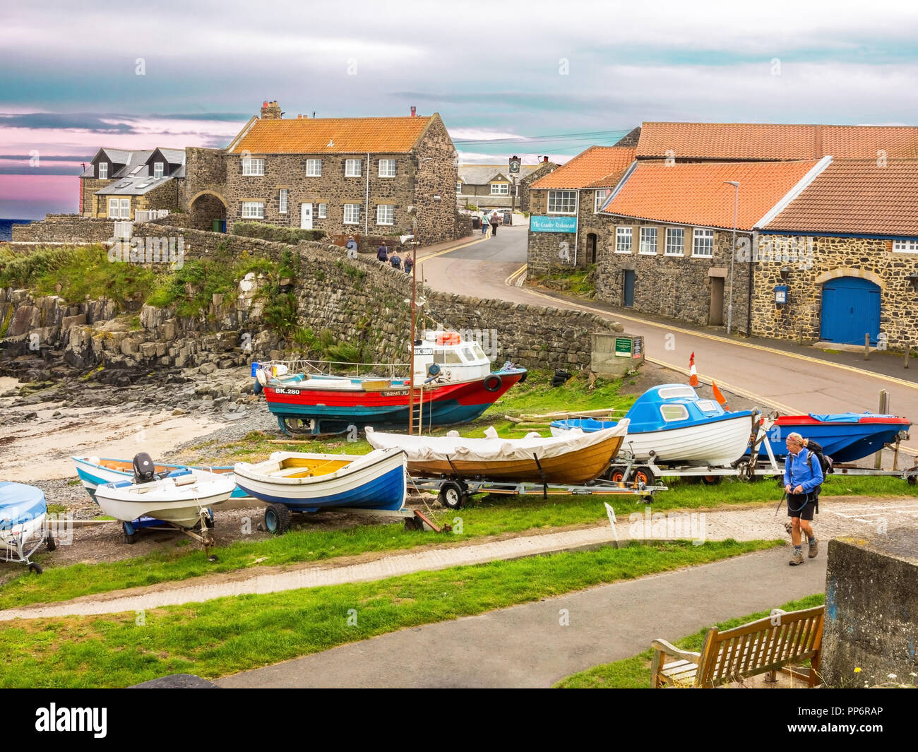 Fishing boats the harbour in the village of Craster Northumberland ...