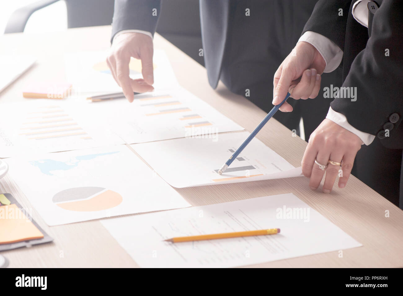 Discussing financial charts hi-res stock photography and images - Alamy