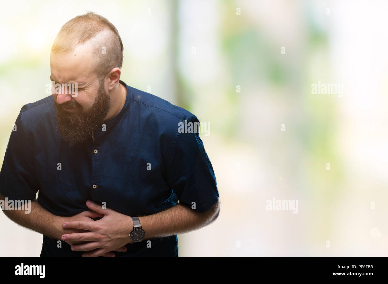 Young caucasian hipster man over isolated background with hand on ...