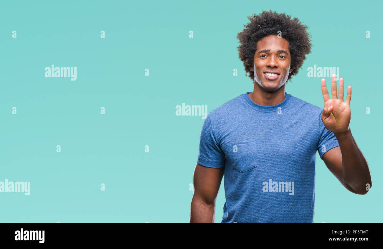 Afro american man over isolated background showing and pointing up with ...