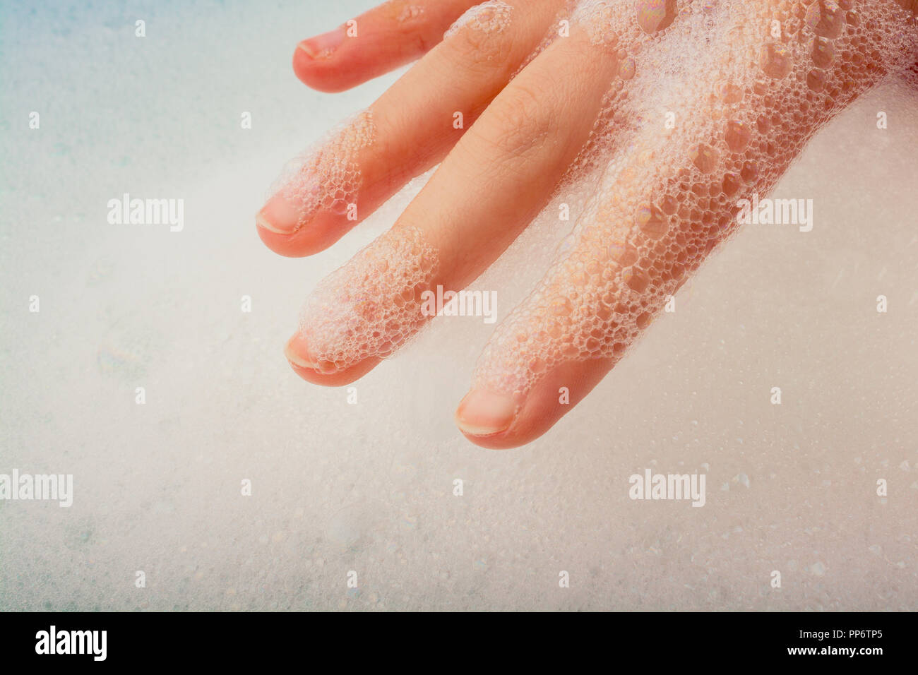 Hand washing and soap foam on a foamy background Stock Photo - Alamy