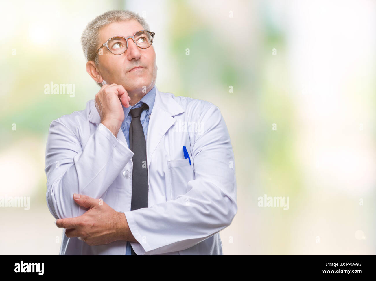 Handsome senior doctor, scientist professional man wearing white coat ...