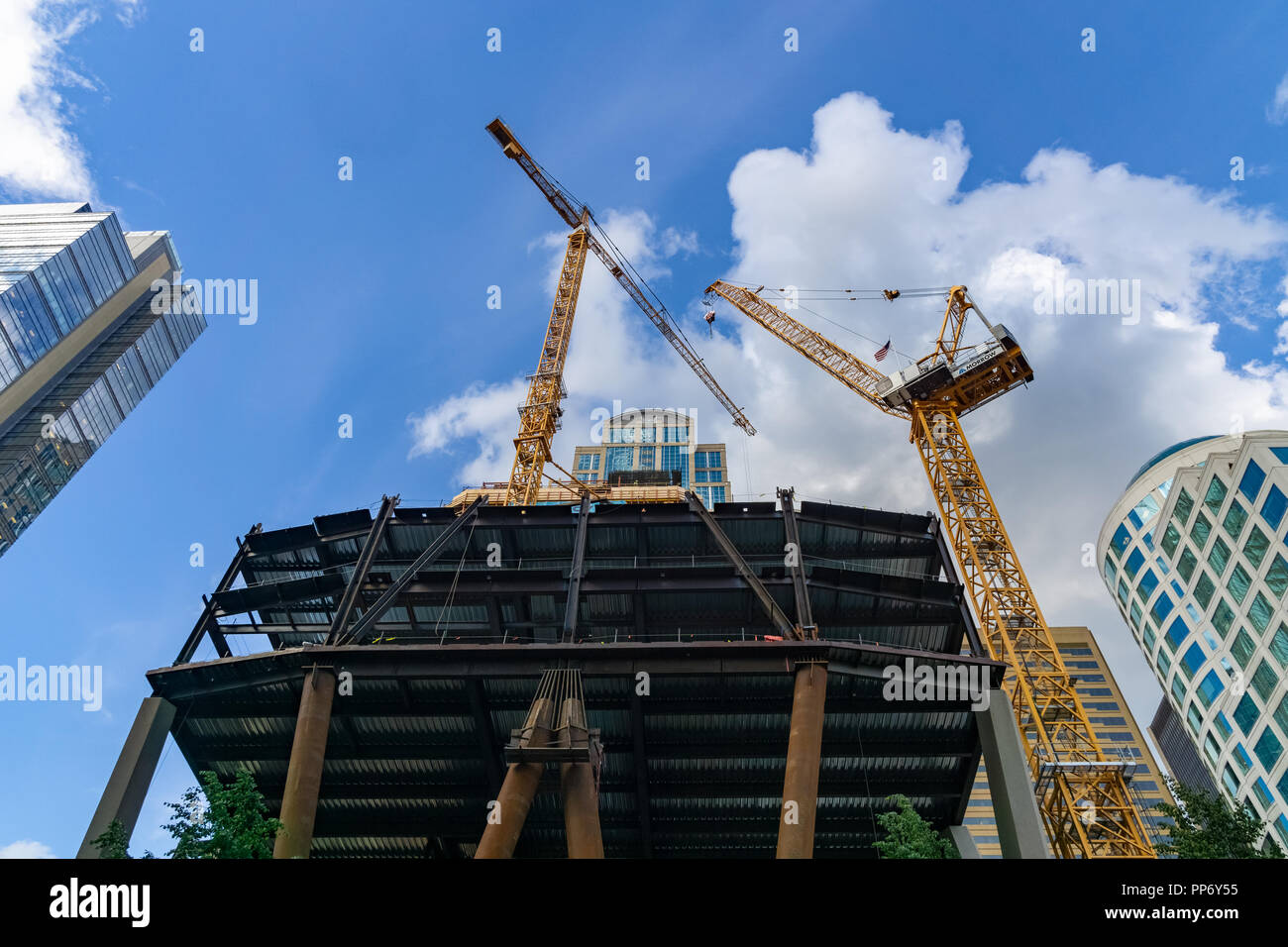 Looking up at the construction site with cranes of the Skanska 2+U ...