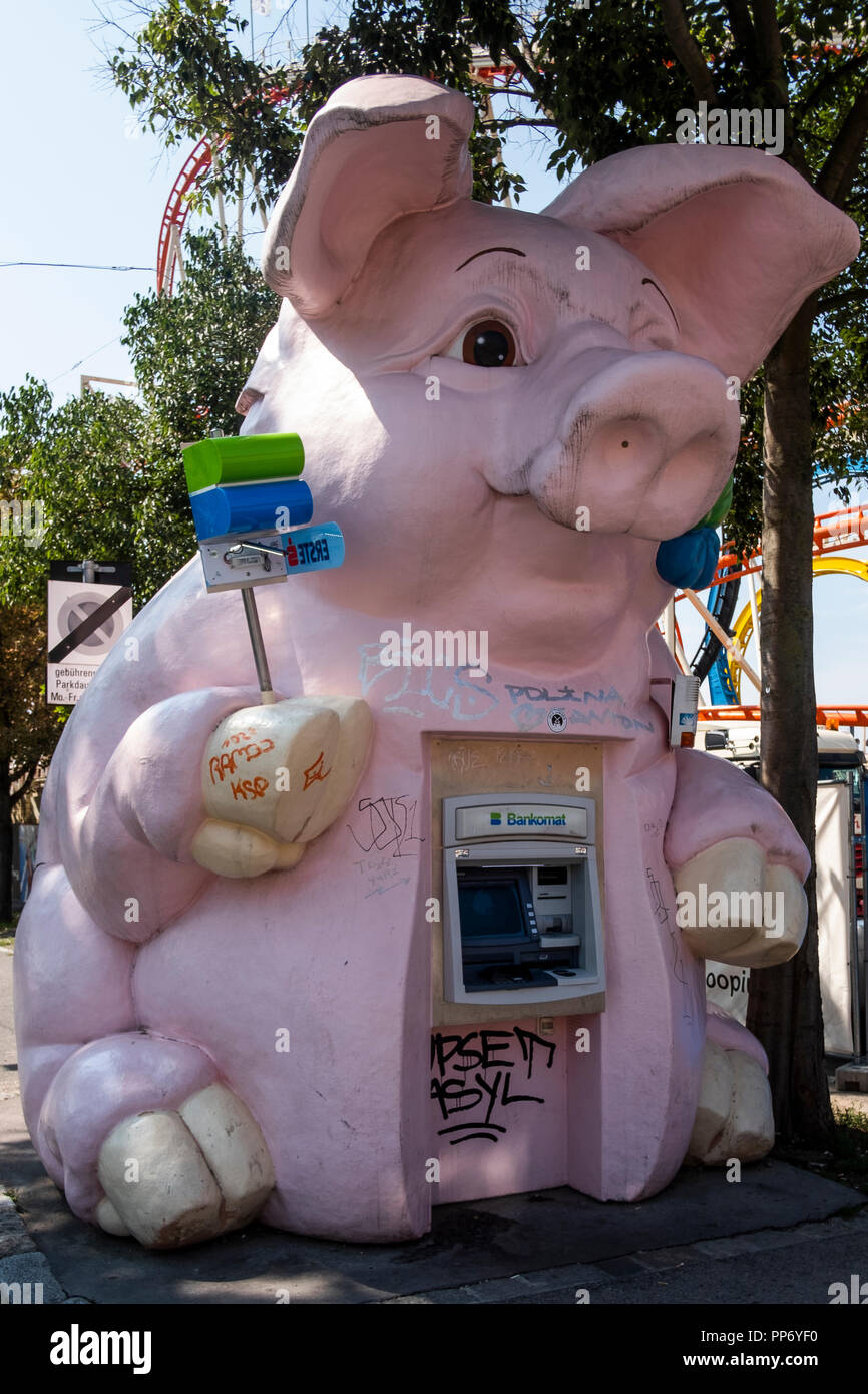Banknote dispenser in the shape of a pig at the entrance to the Prater ...