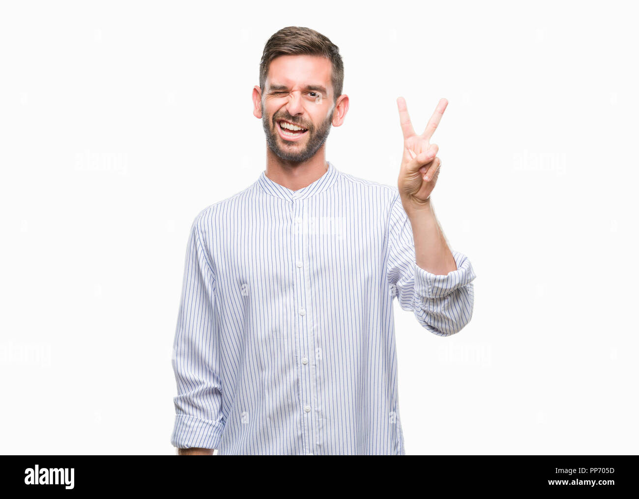 Young handsome man over isolated background smiling with happy face ...
