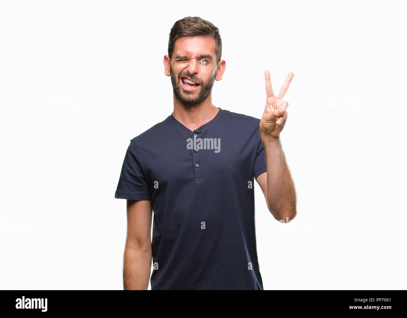 Young handsome man over isolated background smiling with happy face ...