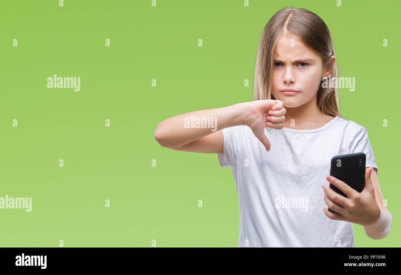 Young beautiful girl sending message texting using smarpthone over ...