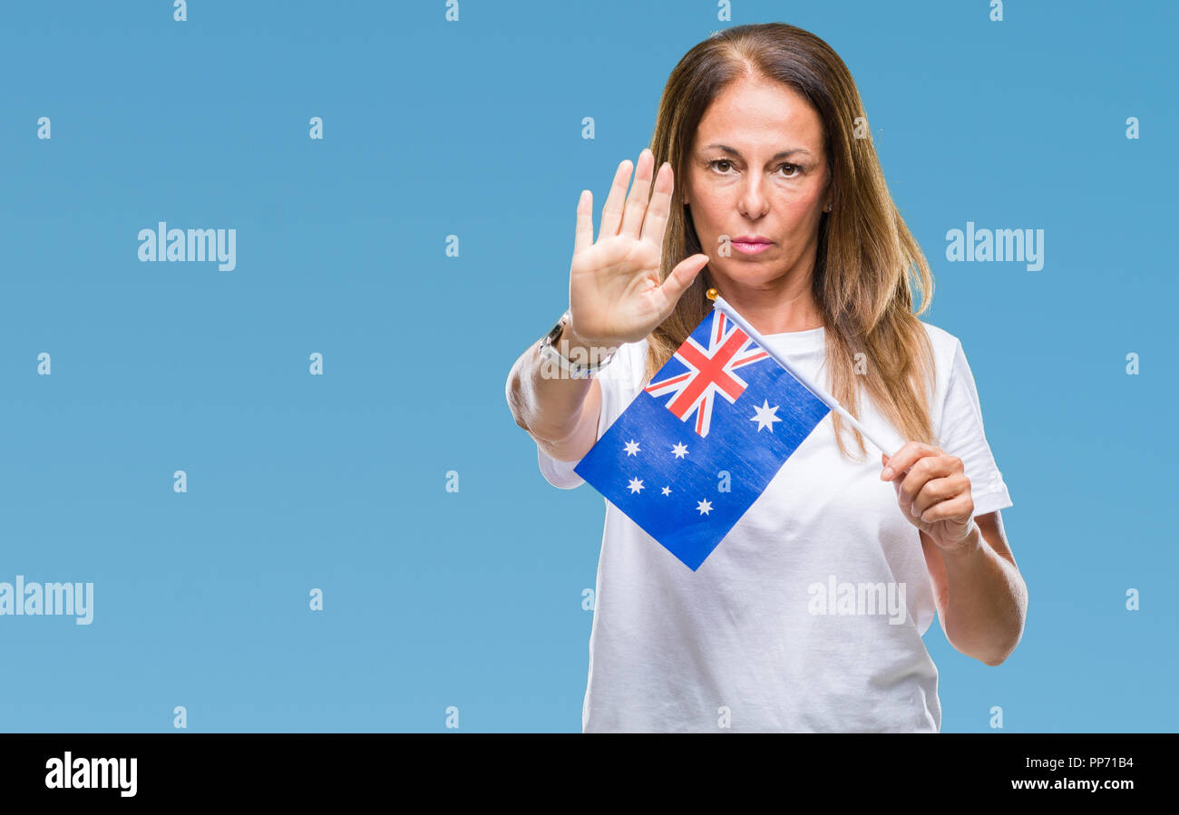 Middle age hispanic woman holding flag of Australia over isolated ...