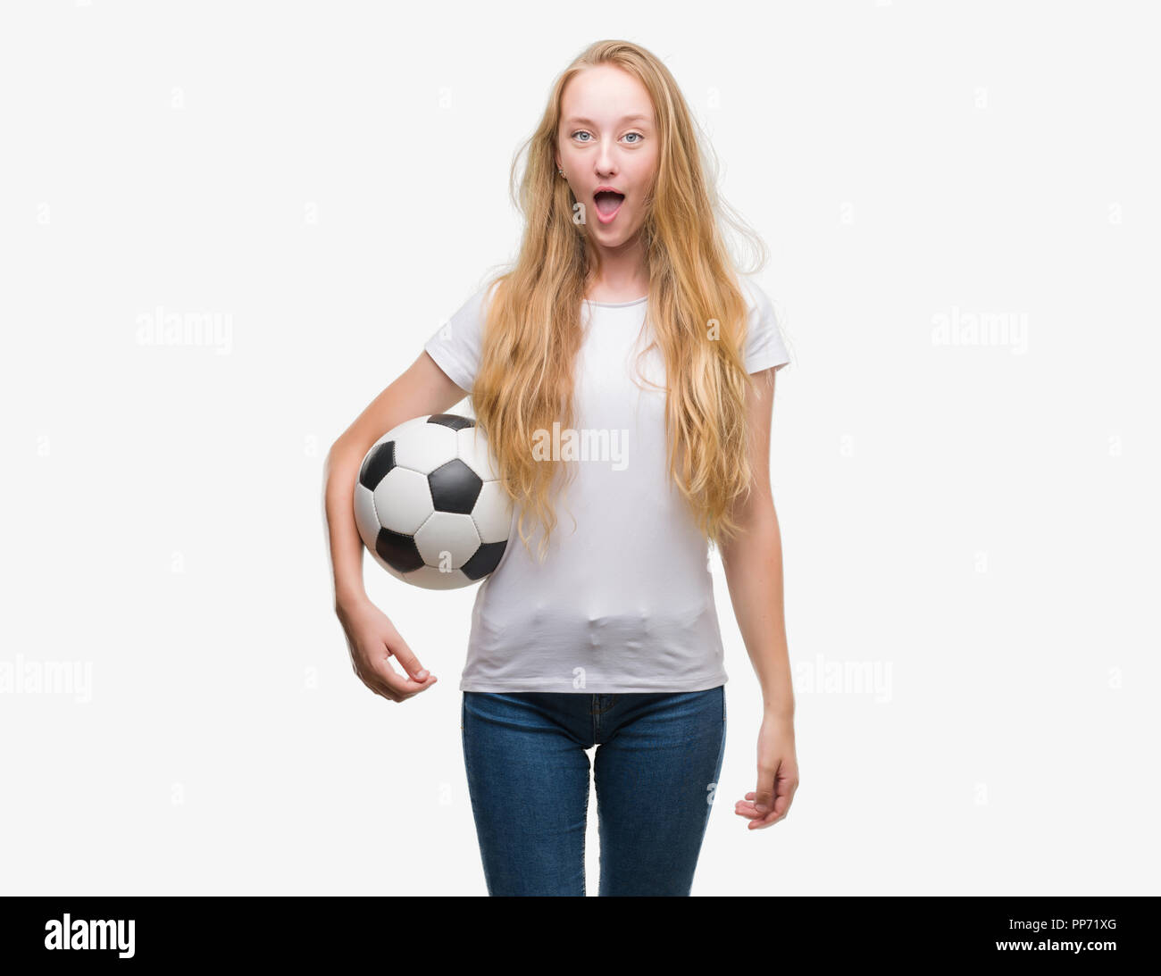 Happy girl in blue soccer hi-res stock photography and images - Alamy