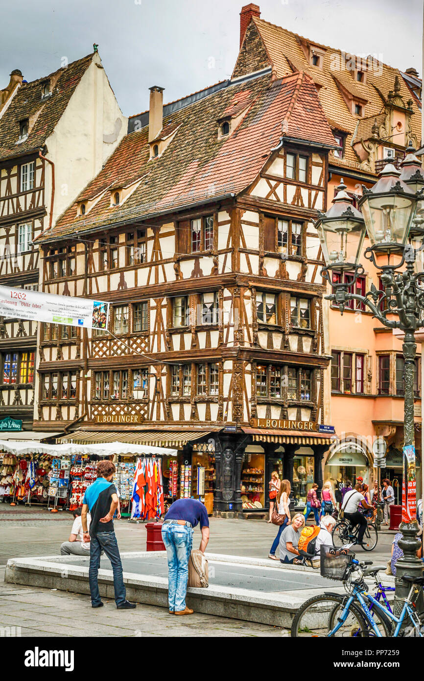 People in Place Gutenberg in the old part of the city of Strasbourg ...