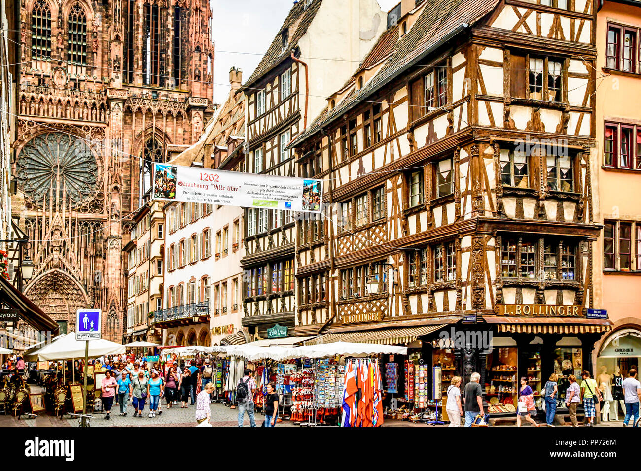 People in Place Gutenberg in the old part of the city of Strasbourg ...