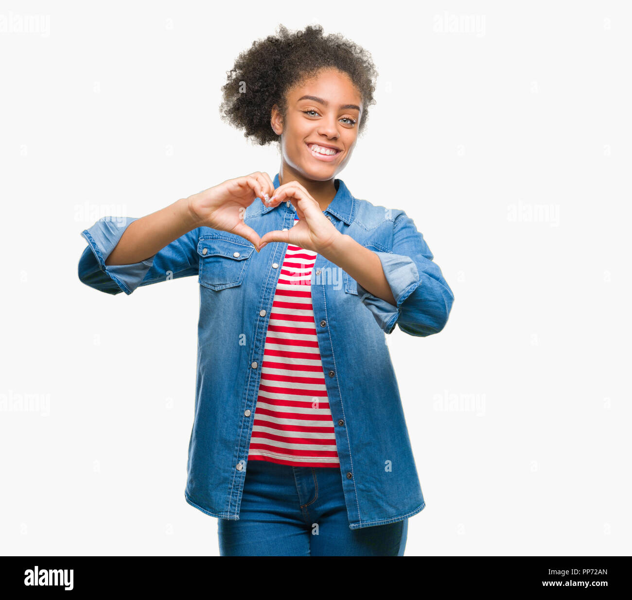 Young afro american woman over isolated background smiling in love ...