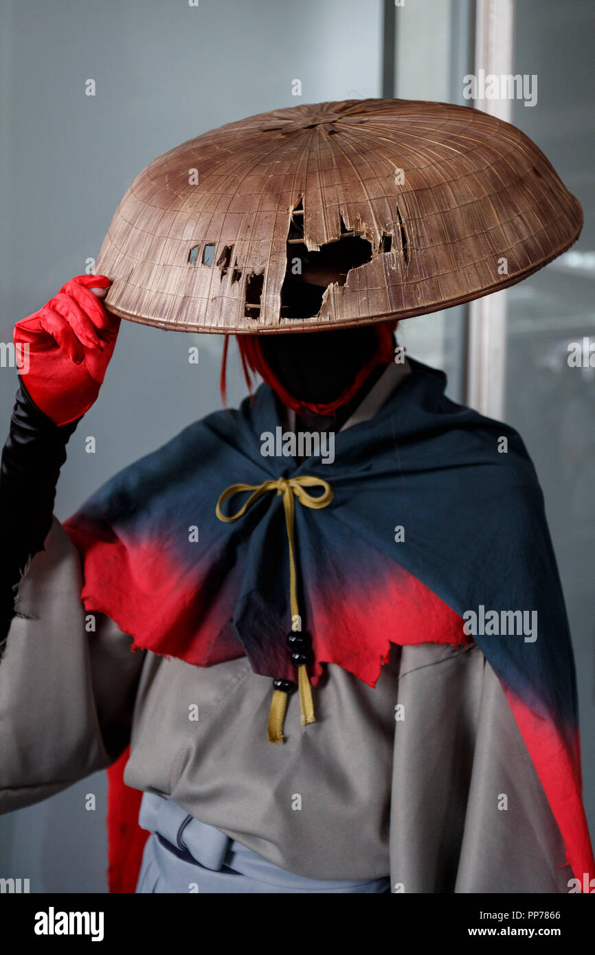 A cosplayer poses for a photograph during the Tokyo Game Show (TGS ...
