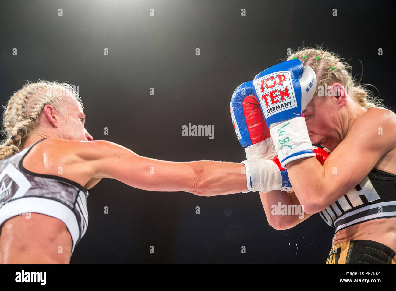 Czech professional boxer Fabiana Bytyqi (right) defeats Denise Castle ...