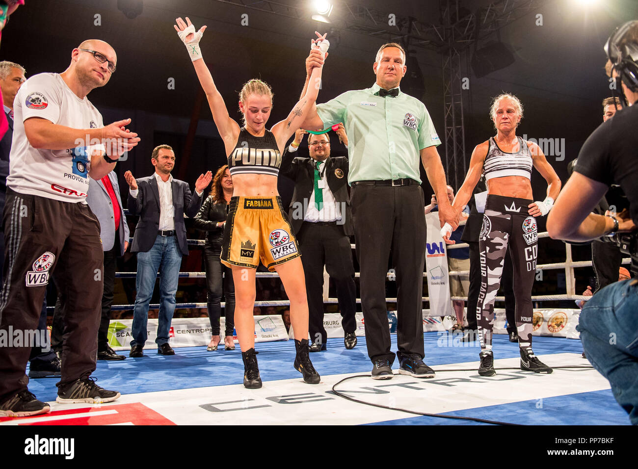 Czech professional boxer Fabiana Bytyqi (left) defeats Denise Castle ...