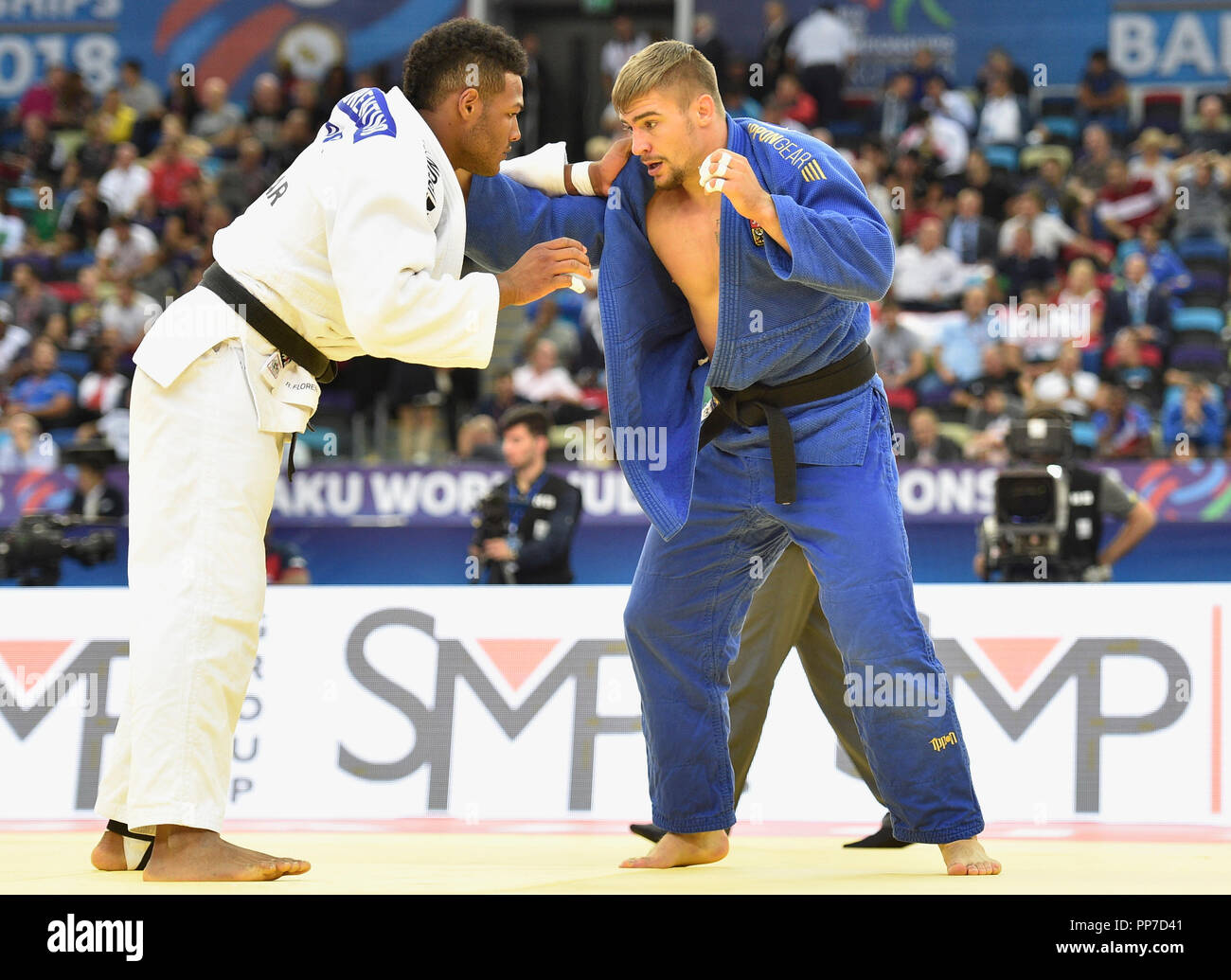 Baku, Azerbaijan. 24th Sep, 2018. Czech judoka David Klammert (in blue ...