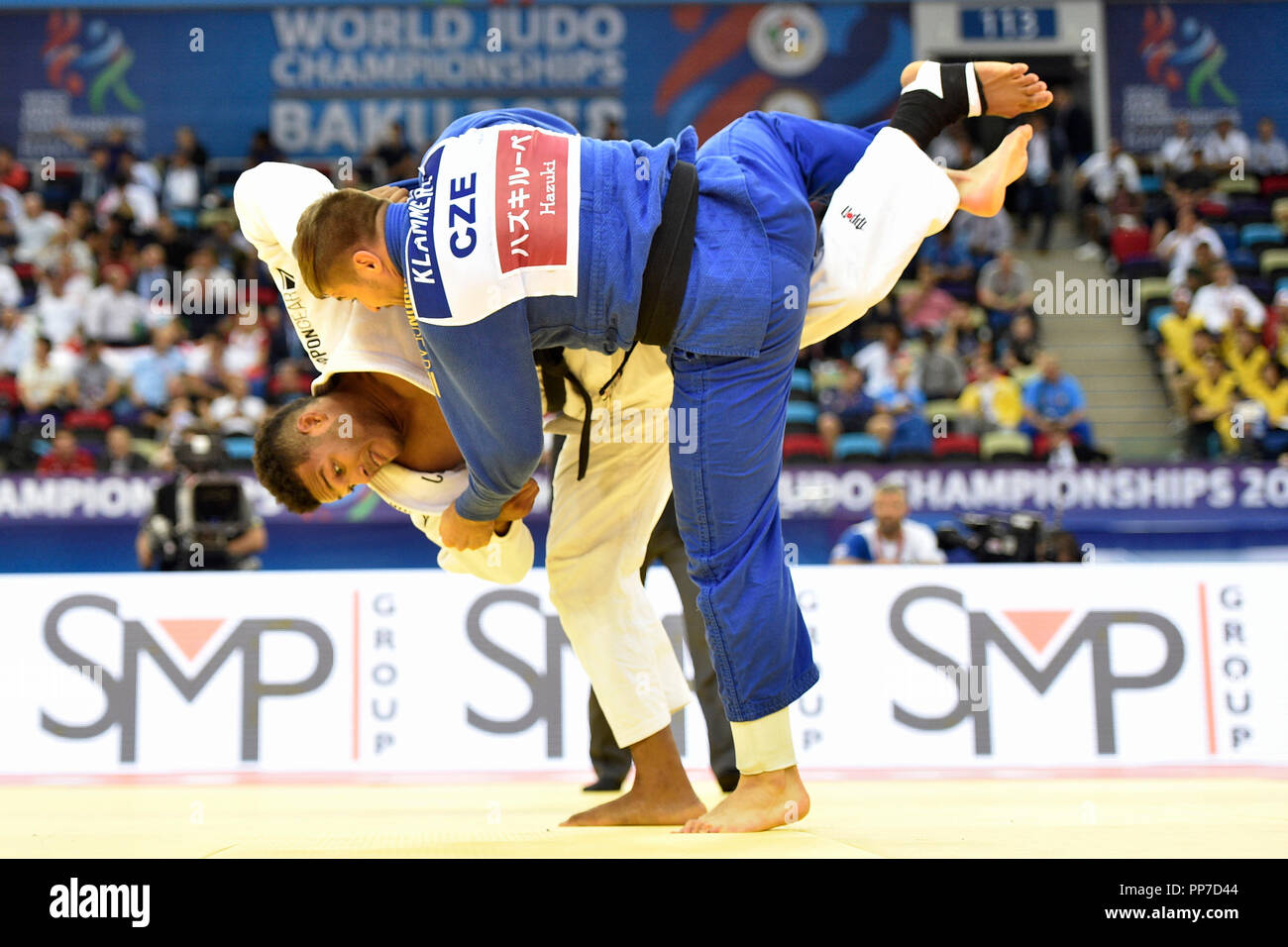 Baku, Azerbaijan. 24th Sep, 2018. Czech judoka David Klammert (in blue ...