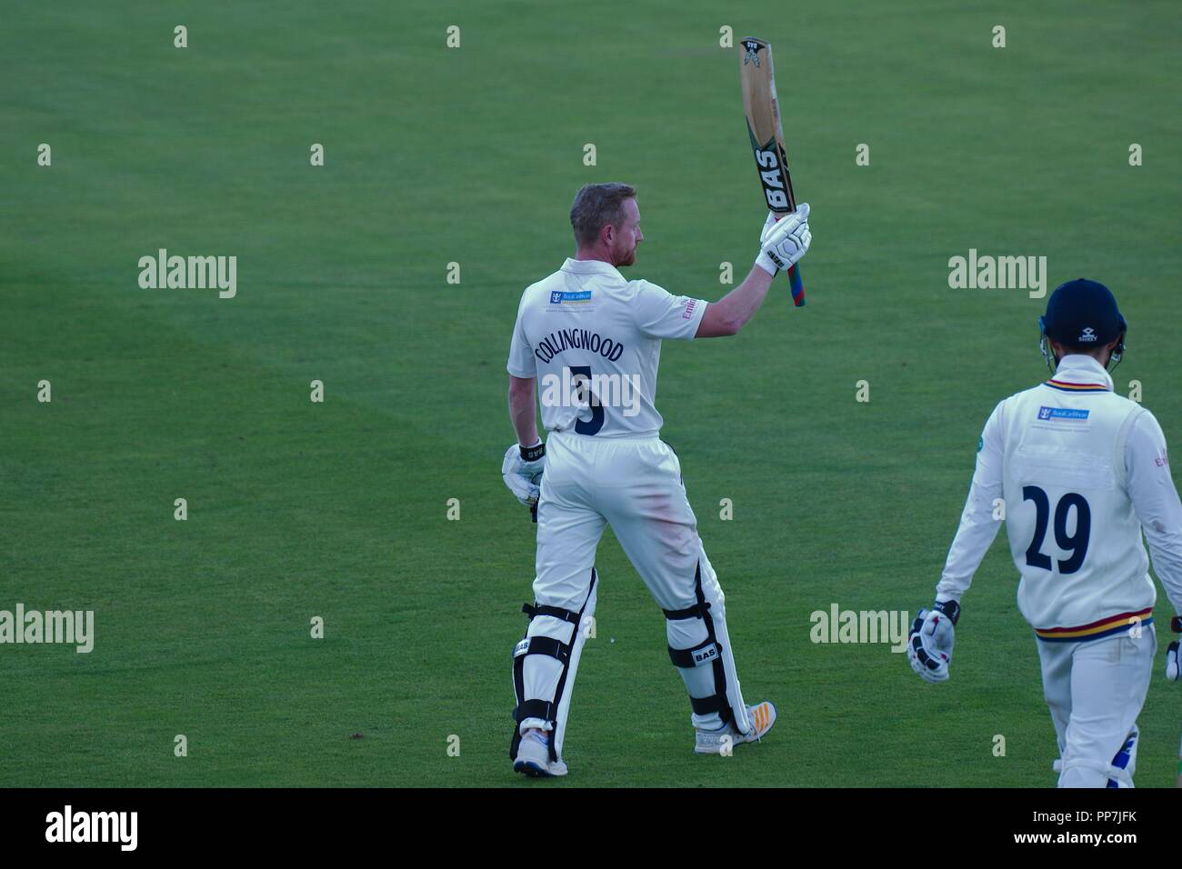 Cricket batsman raising bat hi-res stock photography and images - Alamy