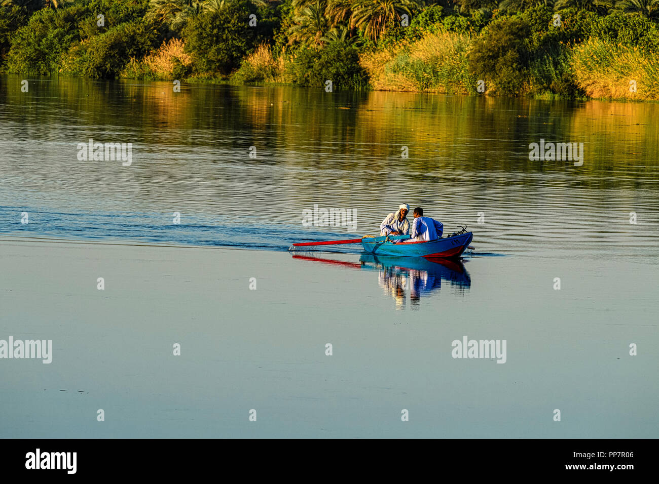 Two Men Fishing From A Boat High Resolution Stock Photography and ...