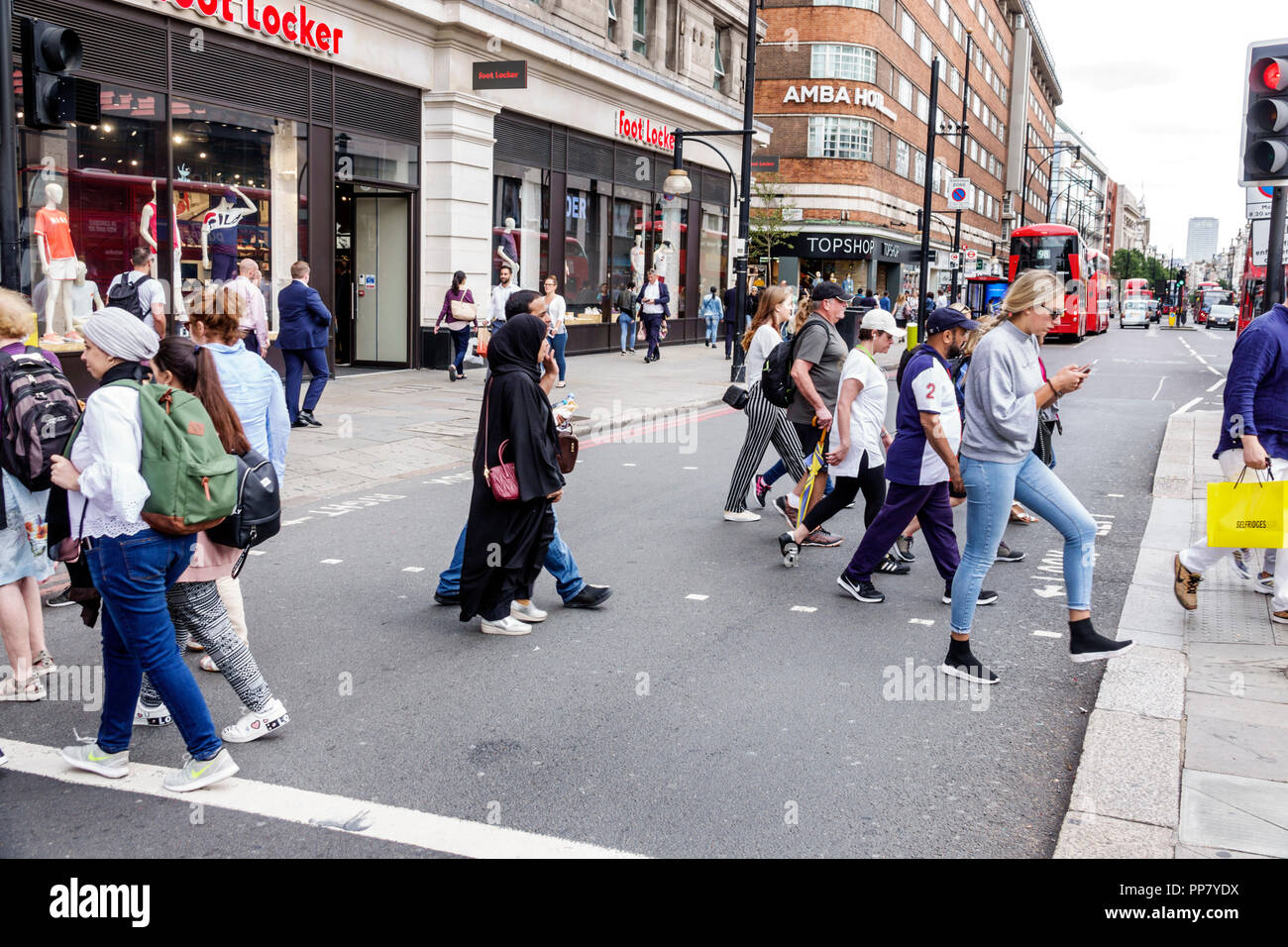 Pedestrians Crossing The Street England Stock Photos & Pedestrians ...