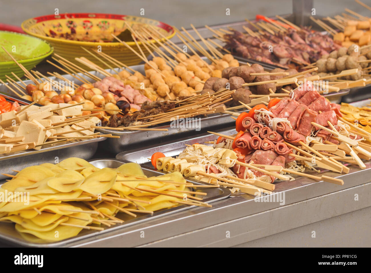 Street food asia. Street food on a stick Stock Photo - Alamy