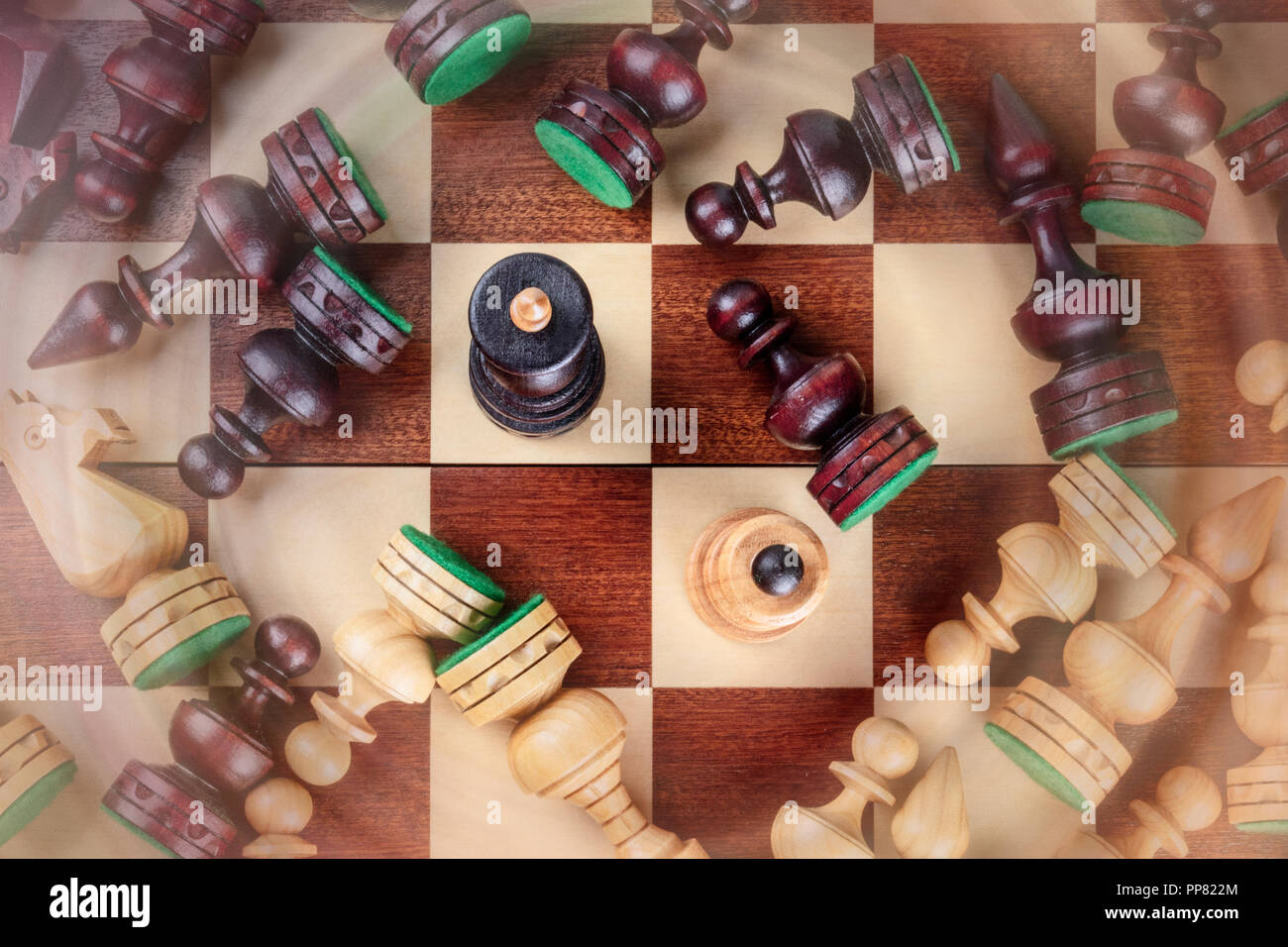 An overhead photo of a checkmate situation in chess with nearly all the ...