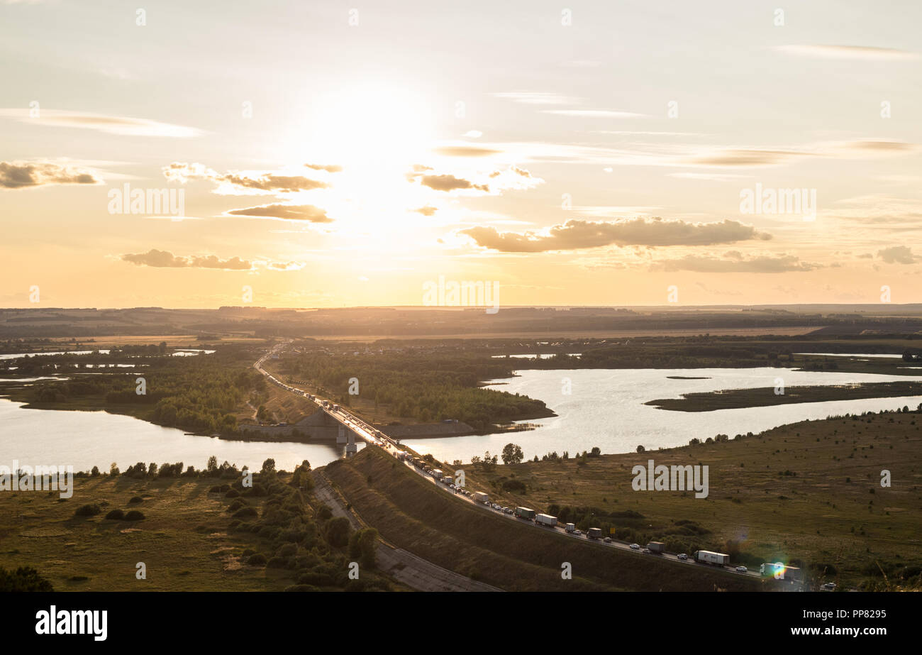 Stream of cars on sunset , car traffic Stock Photo - Alamy
