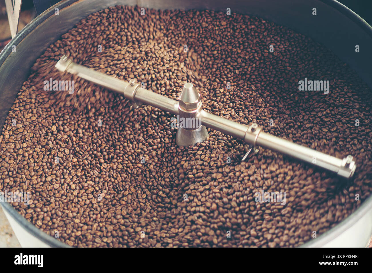 fresh coffee beans in roast machine, arabica roasted coffee ,vintage ...