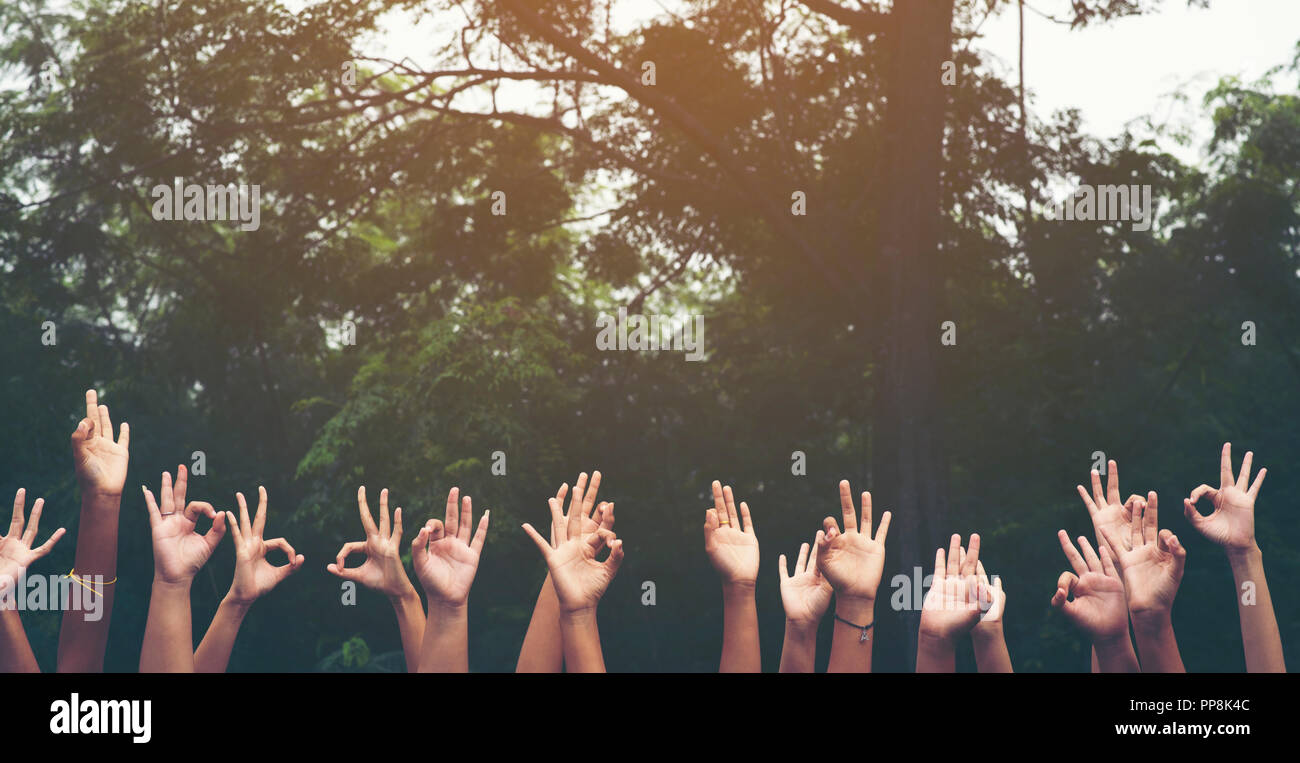 hand up of people working assemble corporate meeting show symbol Join ...