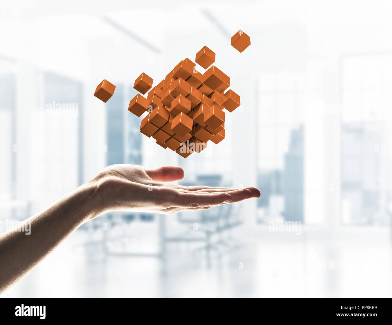 Cube color figure in male palm as symbol for integration. 3D ren Stock ...