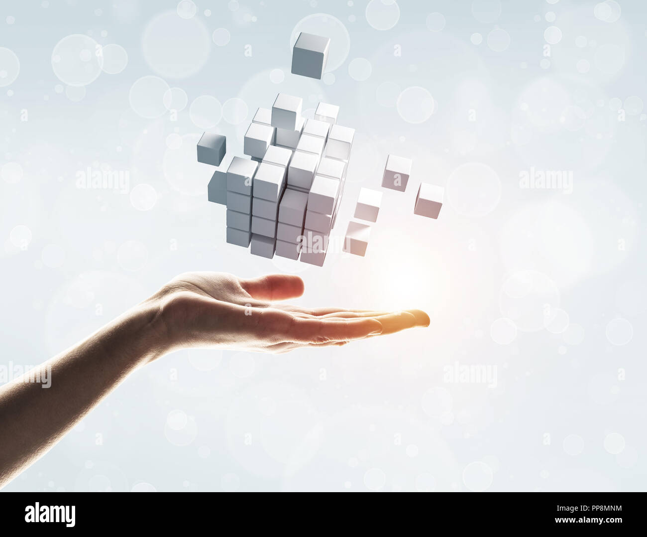 Cube white figure in male palm as symbol for integration. 3D ren Stock ...