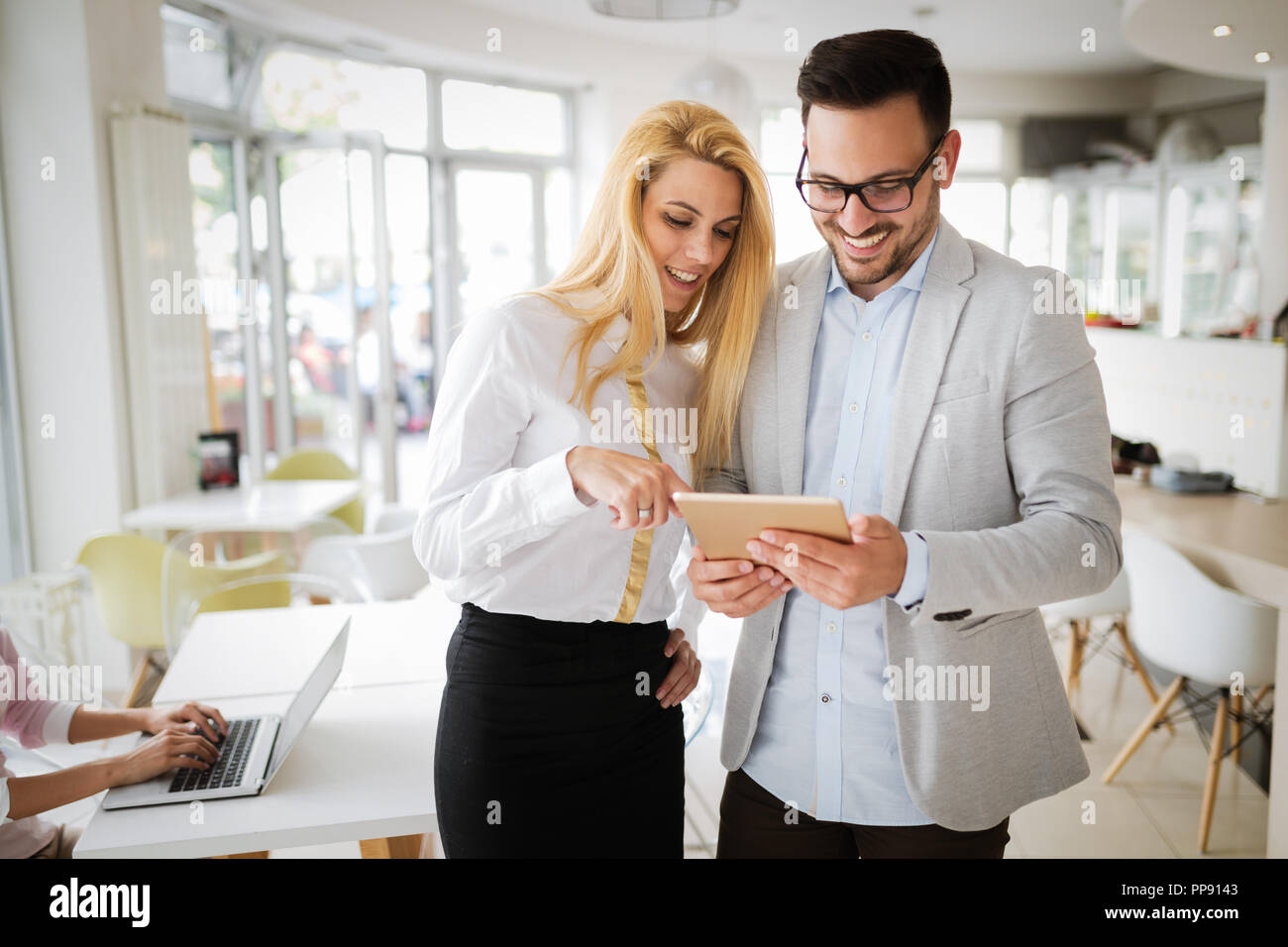 Image of two successful business partners working at meeting Stock ...