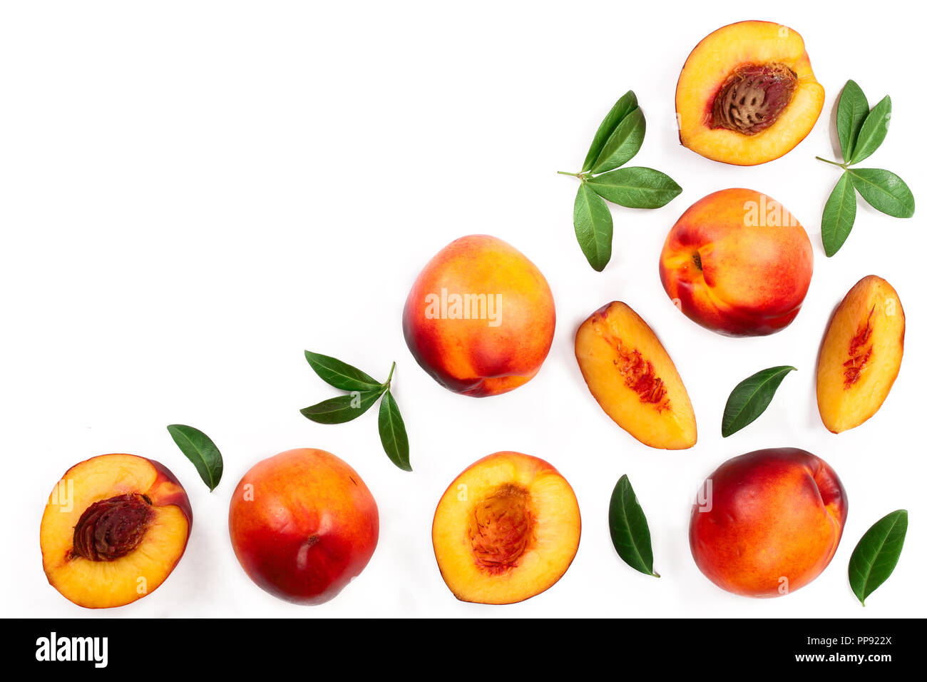 ripe nectarine with leaves isolated on white background with copy space ...