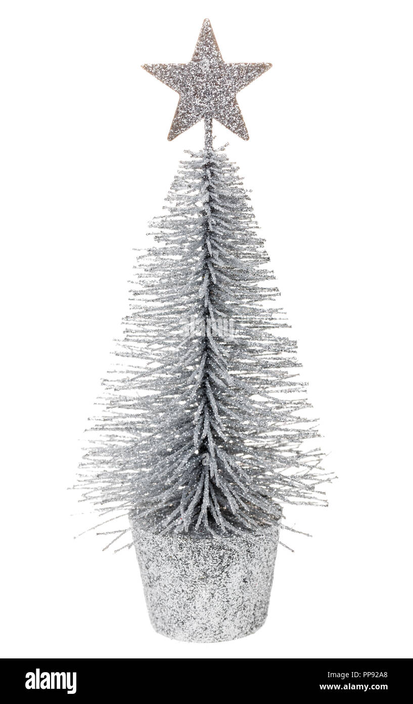 Small tabletop Christmas tree on white background Stock Photo - Alamy