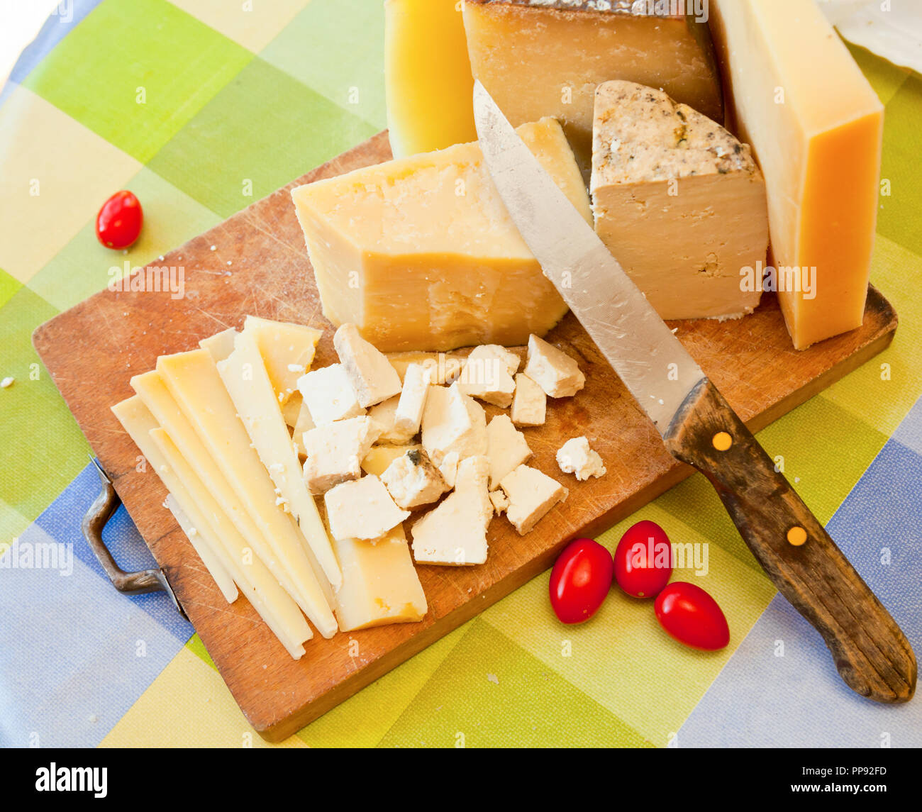 Parmesan cheese cutting knife slices hi-res stock photography and ...
