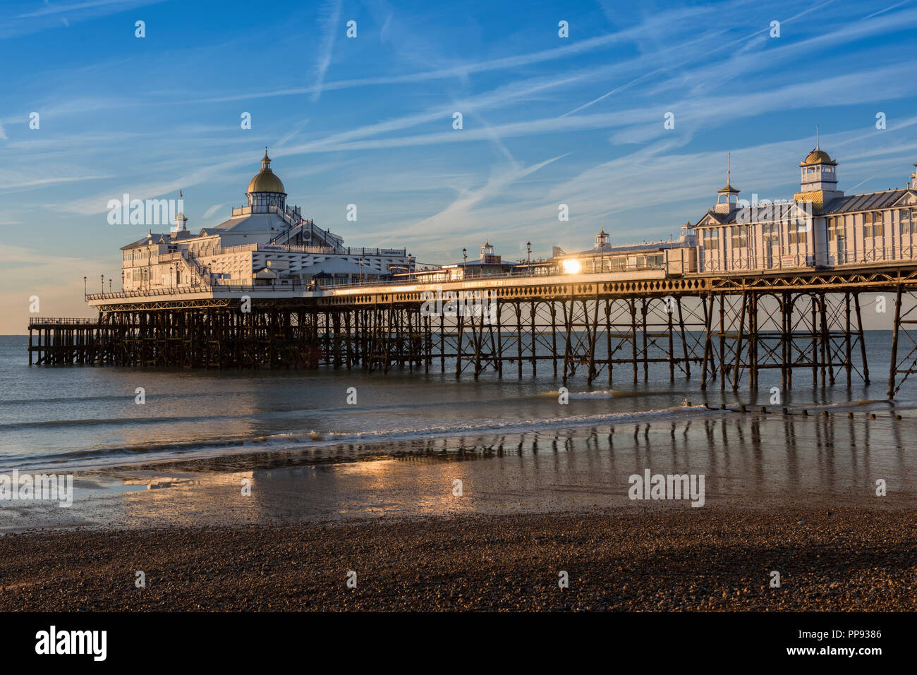 Eastbourne pier beach sunshine hi-res stock photography and images - Alamy