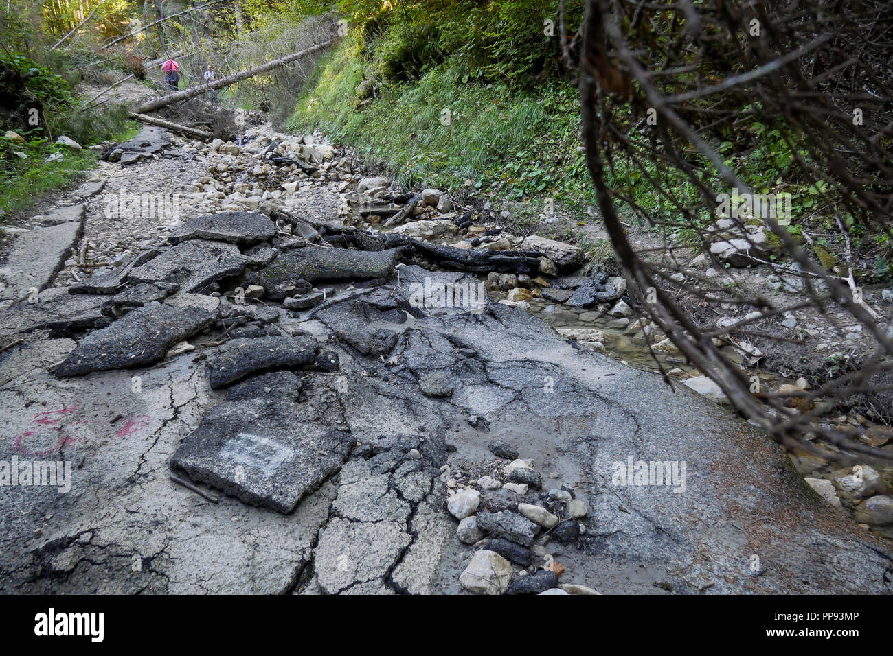 Mountain road destroyed after a landslide due to heavy rainfalls, Saint ...