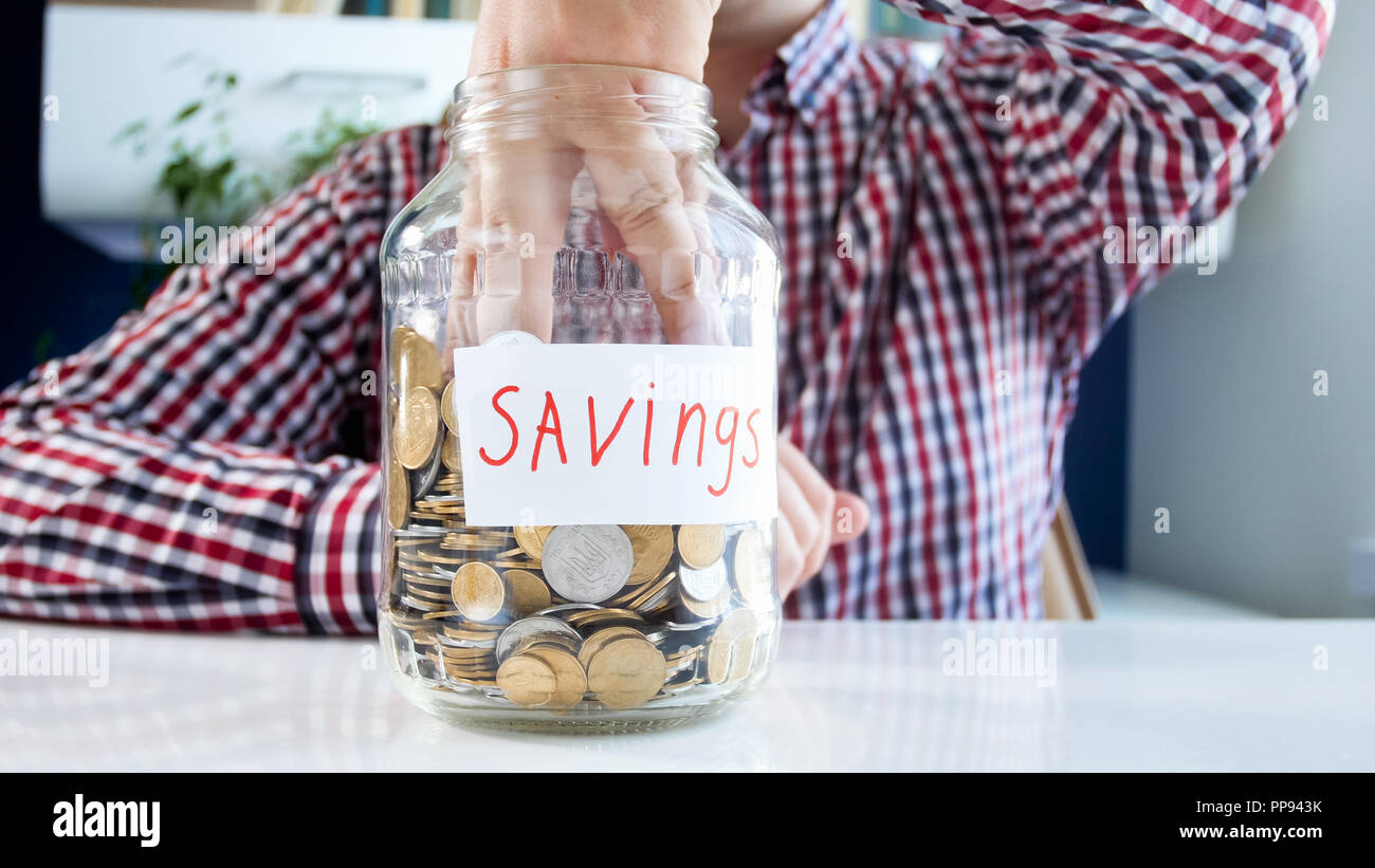 Empty money jar man hi-res stock photography and images - Alamy