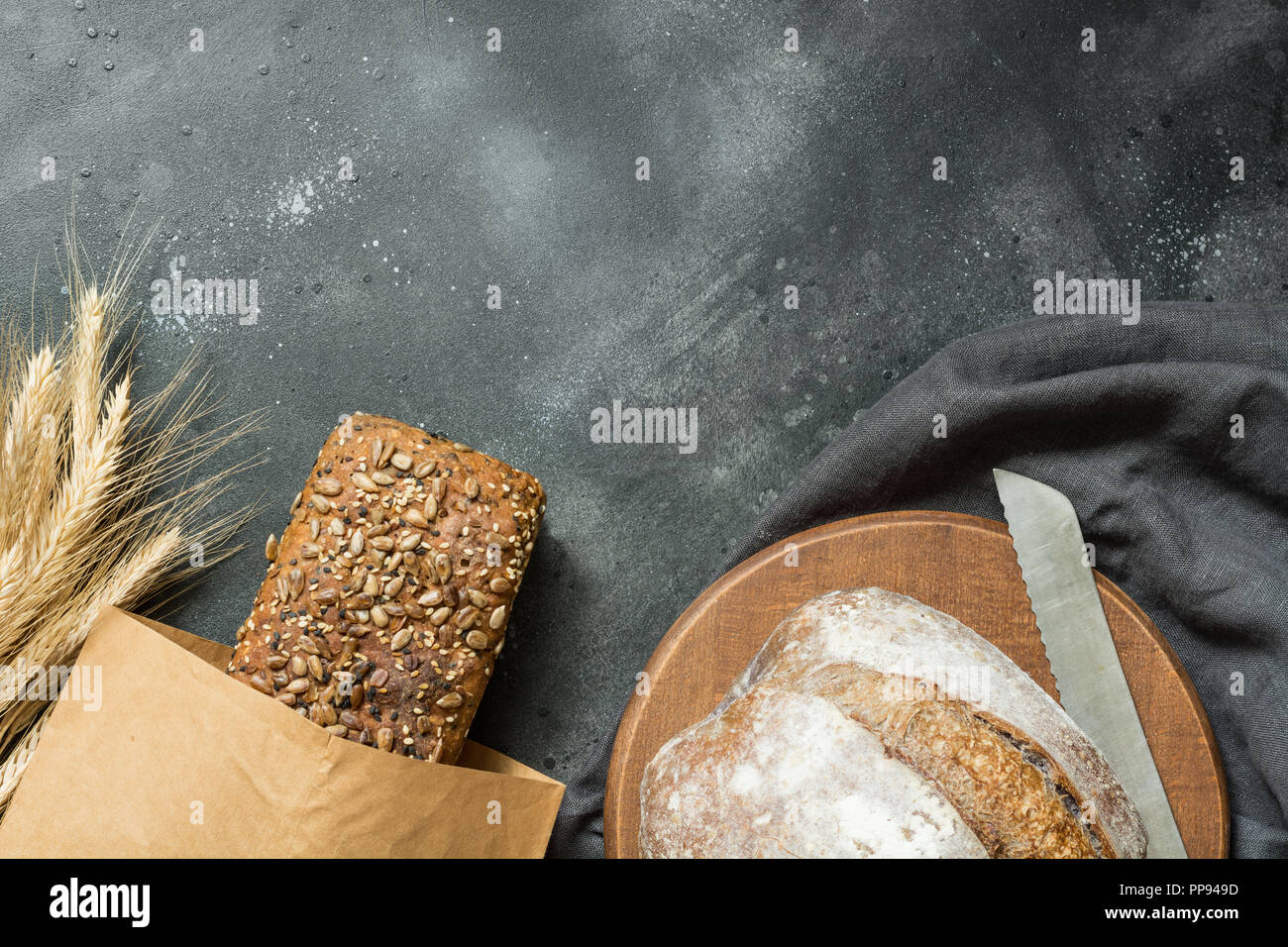 Homemade fresh rye bread on dark rural background. Close up. Space for text Stock Photo - Alamy