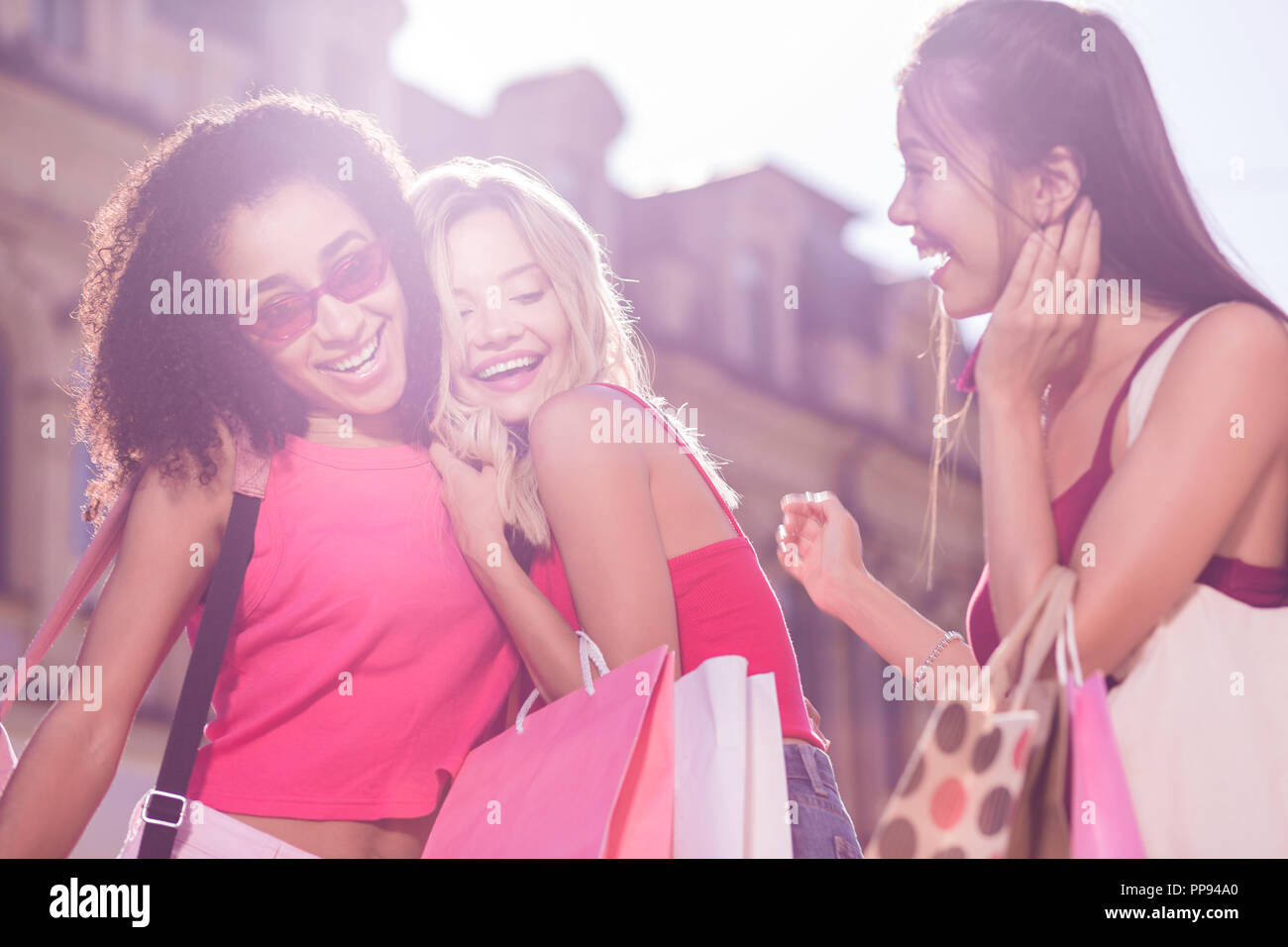 Nice joyful women standing together on the street Stock Photo - Alamy