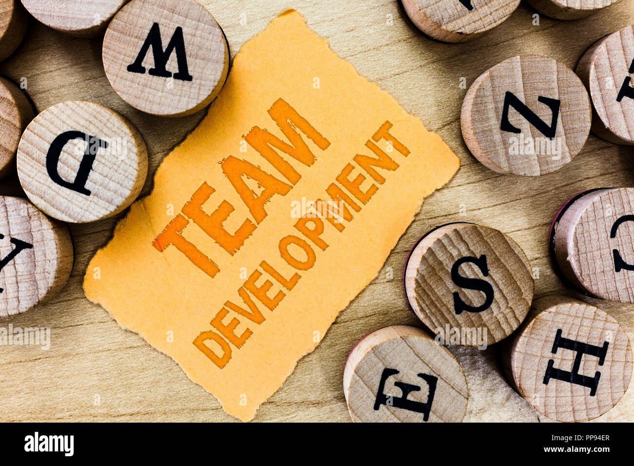 Handwriting text Team Development. Concept meaning learn why and how small groups change over ...